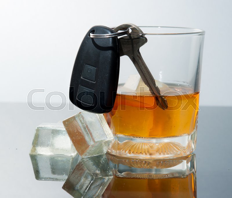 Glass of whiskey and car keys on ... | Stock image | Colourbox
