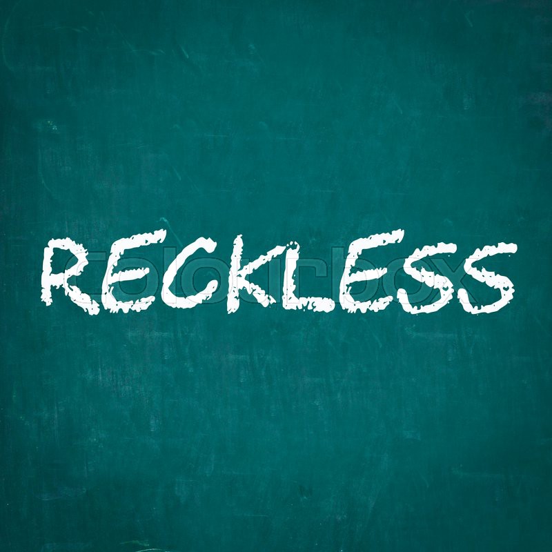RECKLESS written on chalkboard | Stock image | Colourbox