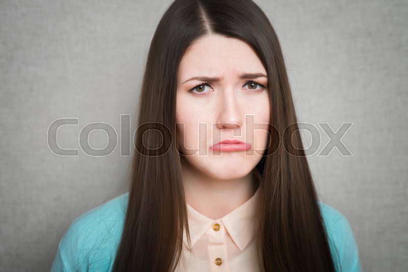 Girl with offended look | Stock Photo | Colourbox