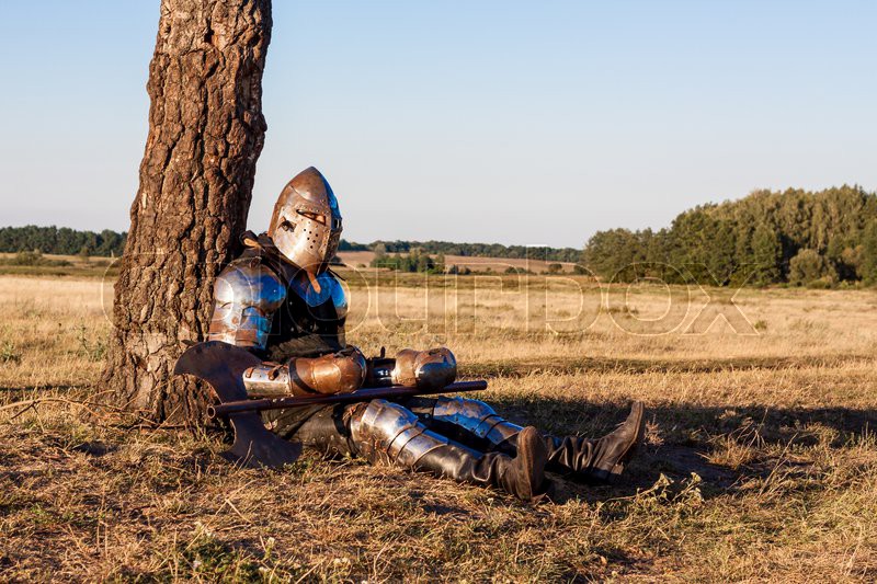 Medieval knight in the field with an ... | Stock image | Colourbox