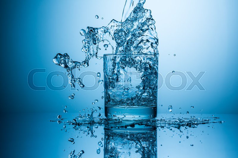 A glass with splashing drink water. ... | Stock image | Colourbox
