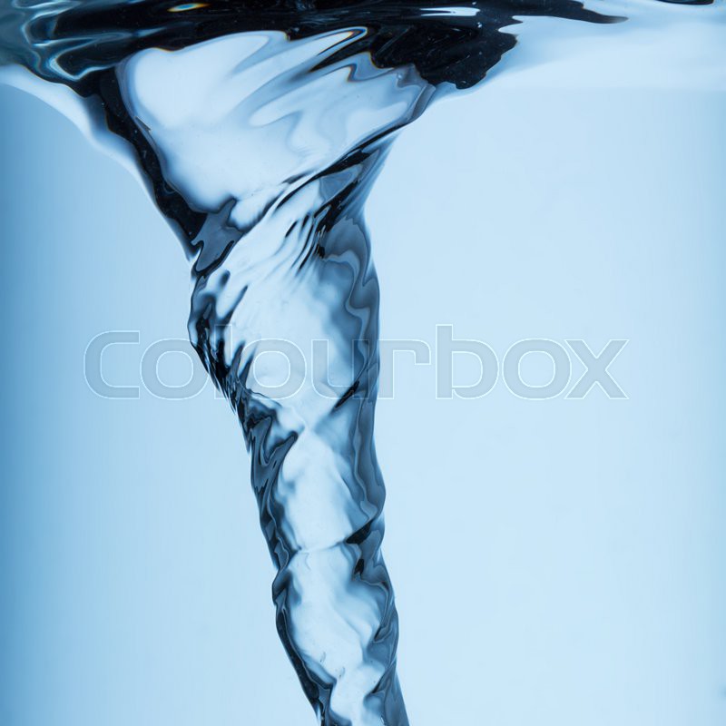 Twisting water on blue gradient ... | Stock image | Colourbox