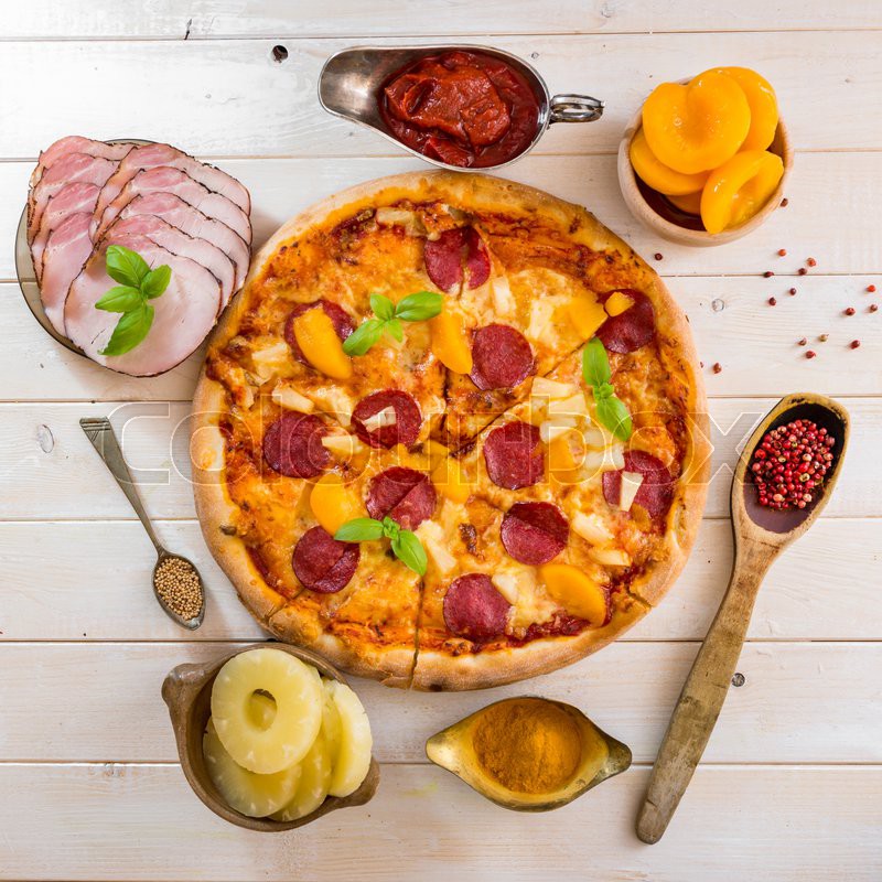 Exotic pizza with pineapple and peach ... | Stock image | Colourbox
