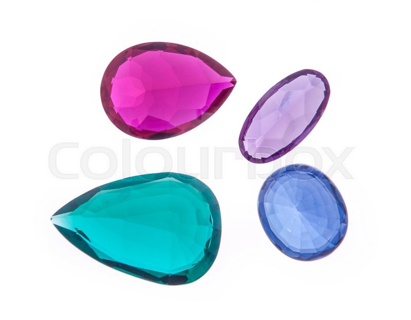 Beautiful glowing gems on a white ... | Stock image | Colourbox