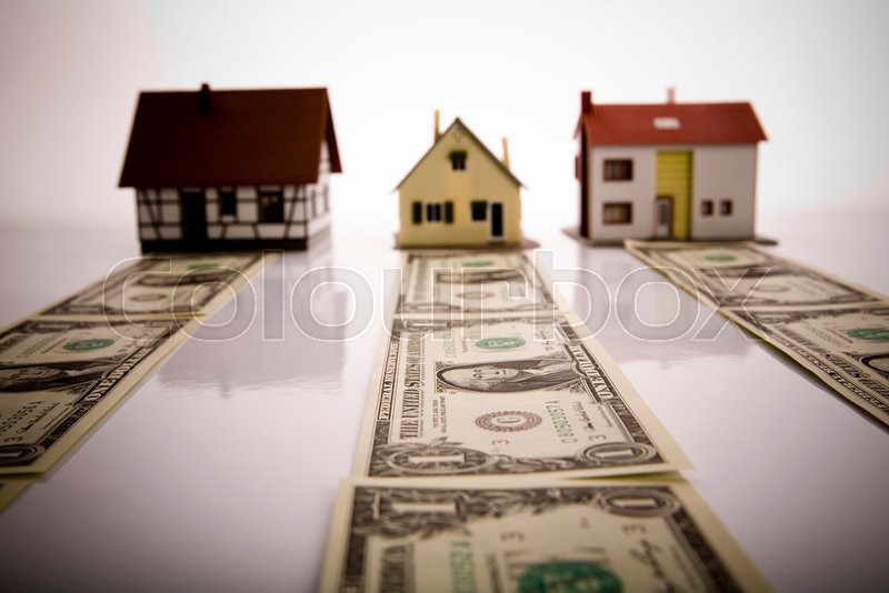 Houses for sale and Money, bright ... | Stock image | Colourbox