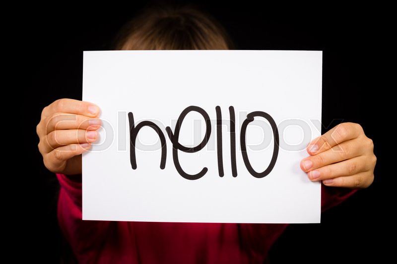 Studio shot of child holding a Hello ... | Stock image | Colourbox