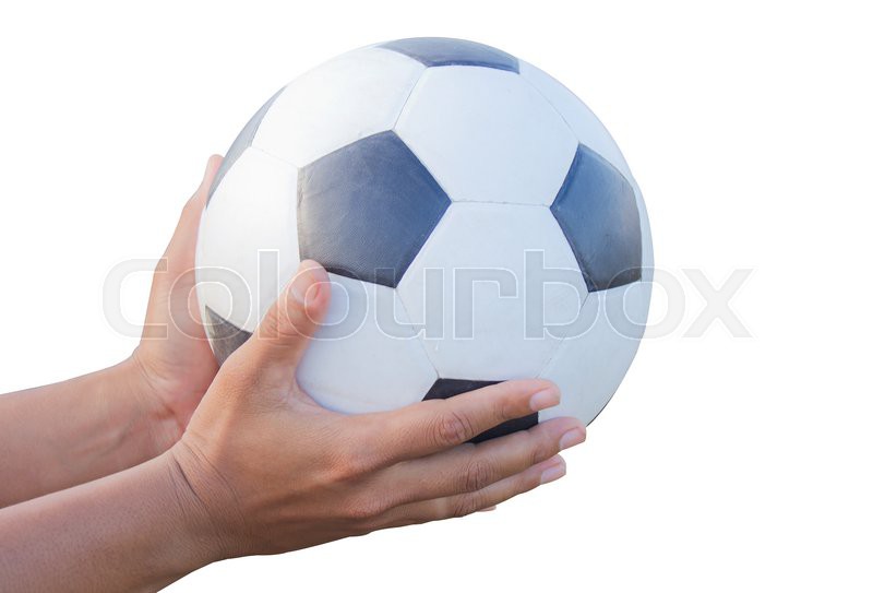 Classic soccer ball in male hands. ... | Stock image | Colourbox