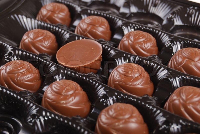 Chocolates in a box of black colour. A ... | Stock image | Colourbox