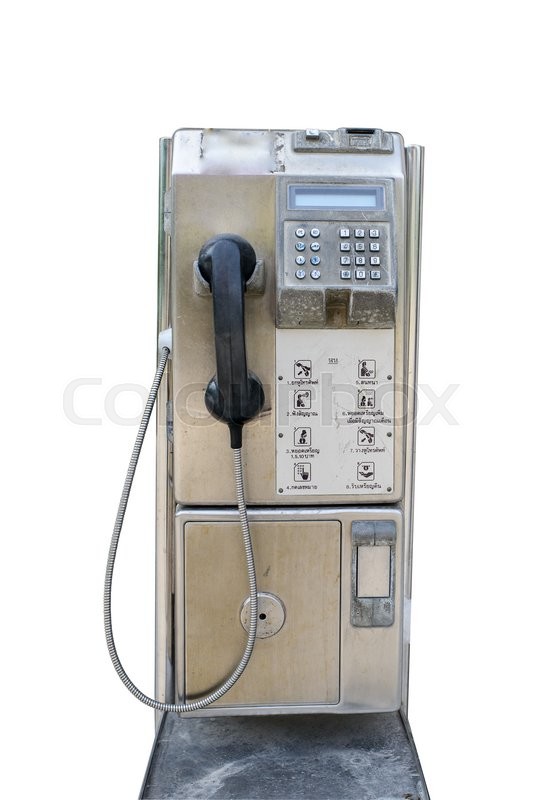 The old public telephone coins isolated ... | Stock image | Colourbox