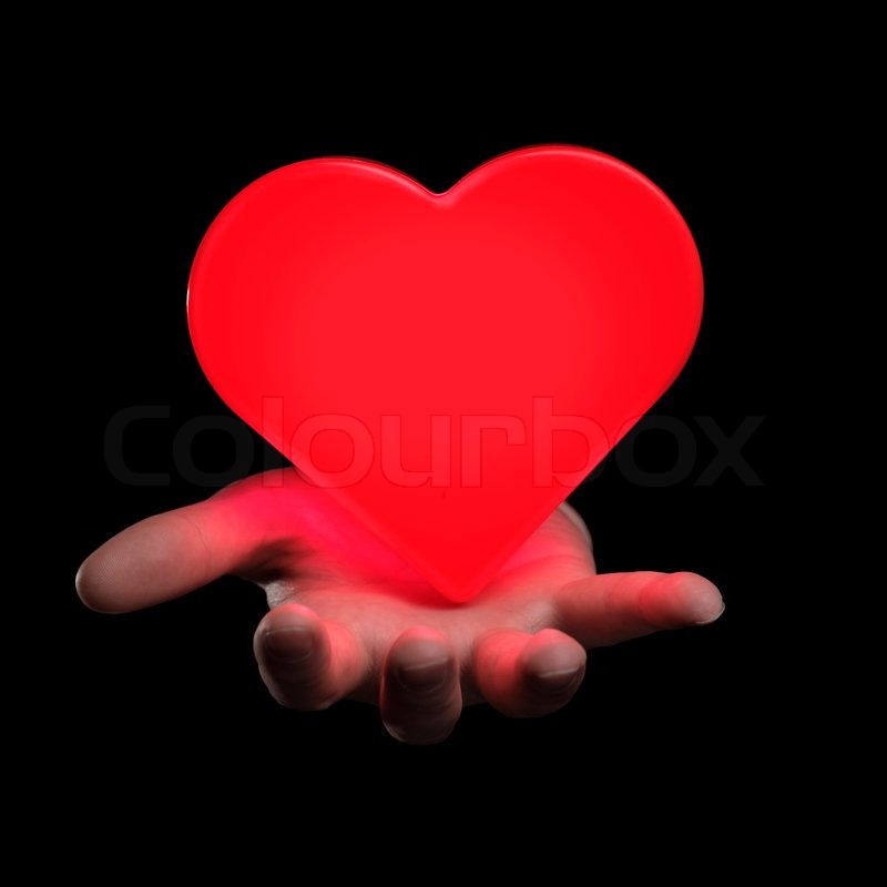 Hand holding a heart with glowing red ... | Stock image | Colourbox