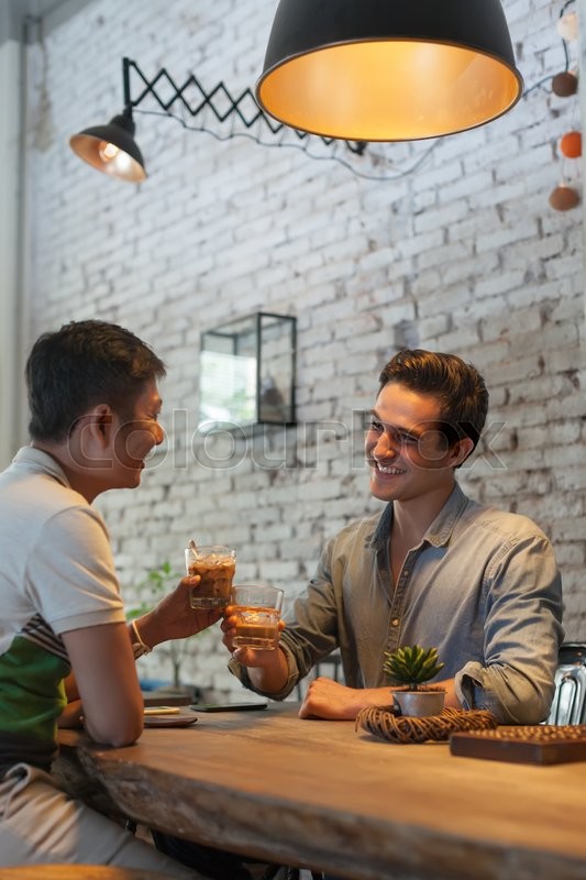Two Men Cheers Toast Drink Ice Coffee, ... | Stock image | Colourbox