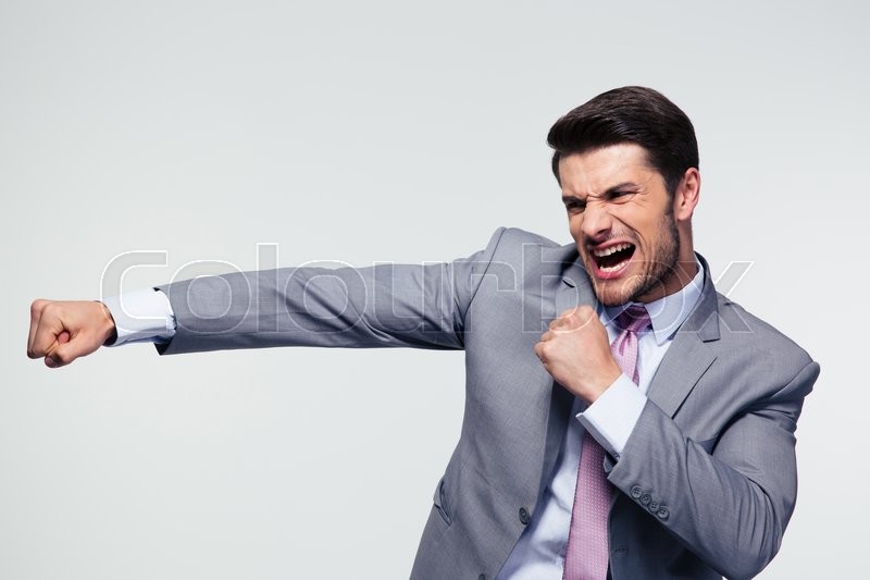 Angry businessman fighting and shouting ... | Stock image | Colourbox