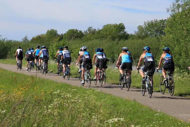 The group of cyclers cycling over the ... | Stock image | Colourbox