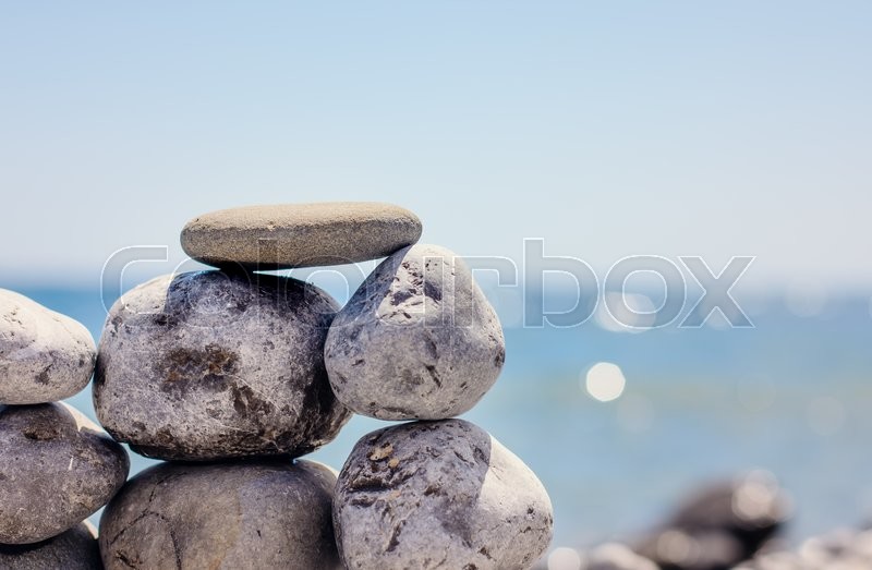 Balancing Rocks On The Beach