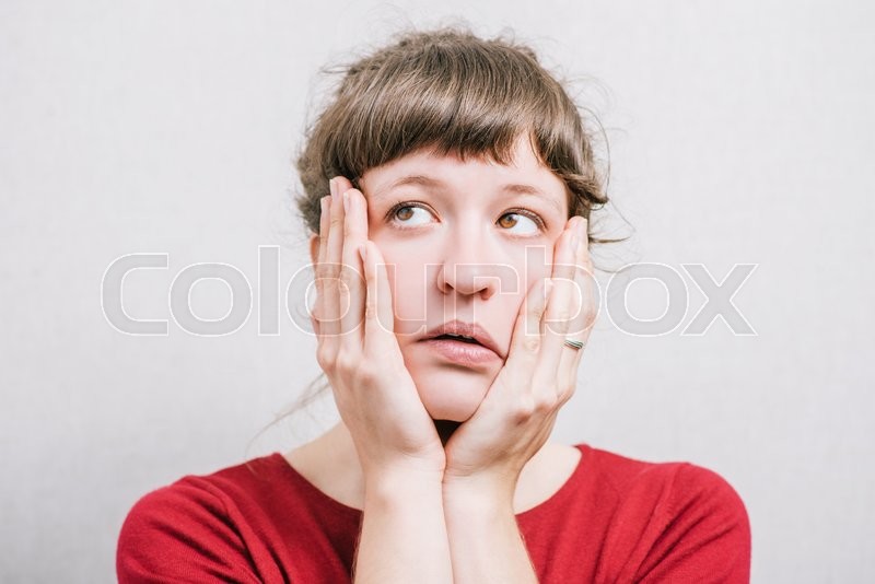 The woman was nervous, thinking with ... | Stock image | Colourbox