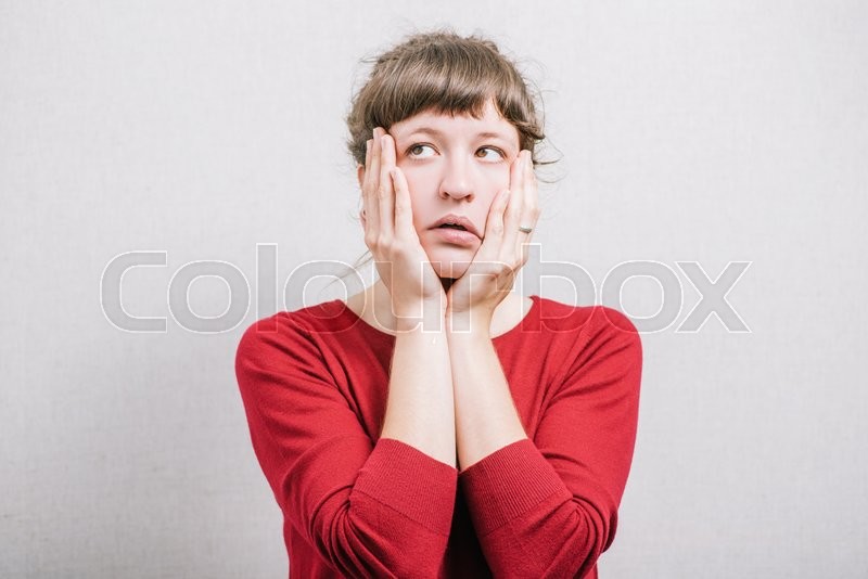 The woman was nervous, thinking with ... | Stock image | Colourbox