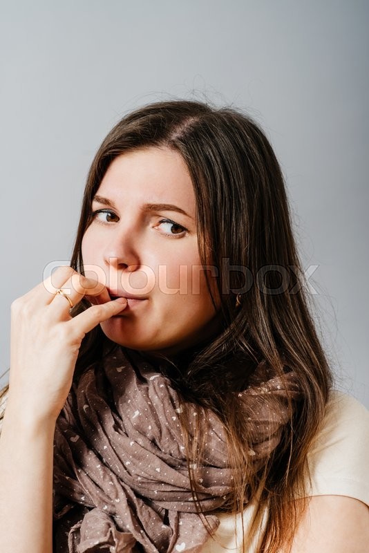 Young woman is thinking and nervous ... | Stock Photo | Colourbox