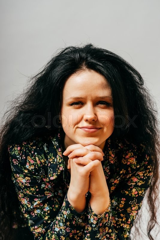 Girl put her chin on her hand | Stock image | Colourbox
