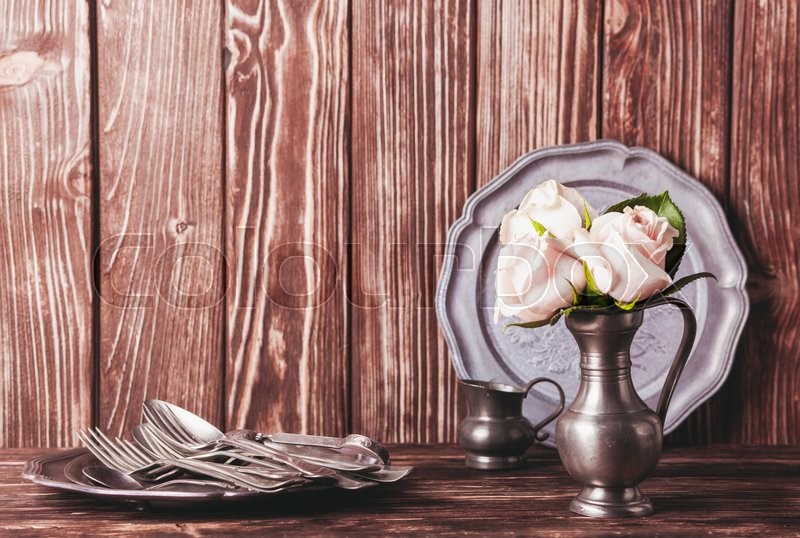 Still life with antique cutlery, plate ... | Stock Photo | Colourbox