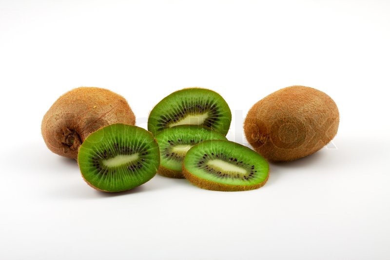 Bright green kiwi on a white background | Stock Photo | Colourbox