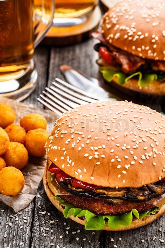 Delicious burgers with fried potato ... | Stock image | Colourbox
