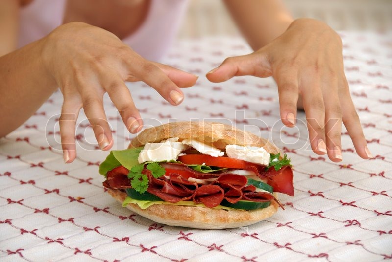 Hungry girl hands over appetizing big ... | Stock image | Colourbox
