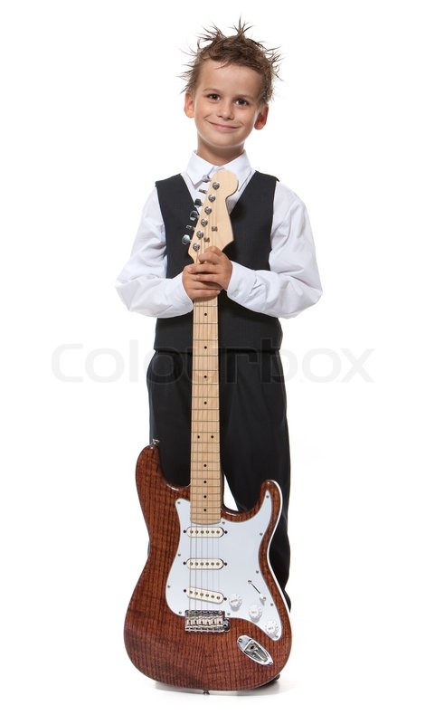 Boy holding a guitar isolated on a ... | Stock image | Colourbox