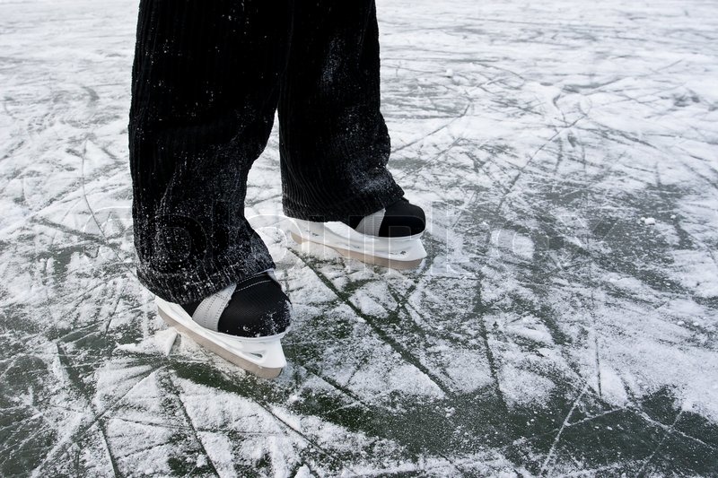 Ice skates background with cracks and ... | Stock image | Colourbox