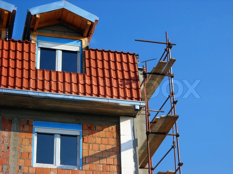 Scaffolding on building corner on ... | Stock image | Colourbox