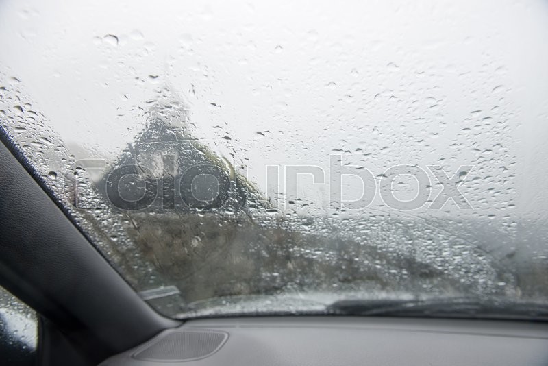 The front window of a car in heavy rain ... | Stock image | Colourbox