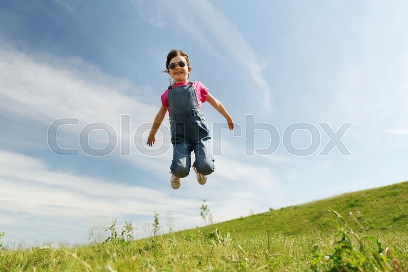 Happy Little Girl Jumping