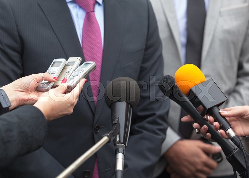 Journalists making interview with ... | Stock image | Colourbox
