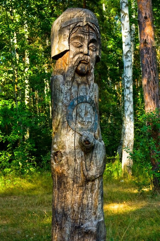 Wooden idol in woods made the unknown ... | Stock image | Colourbox