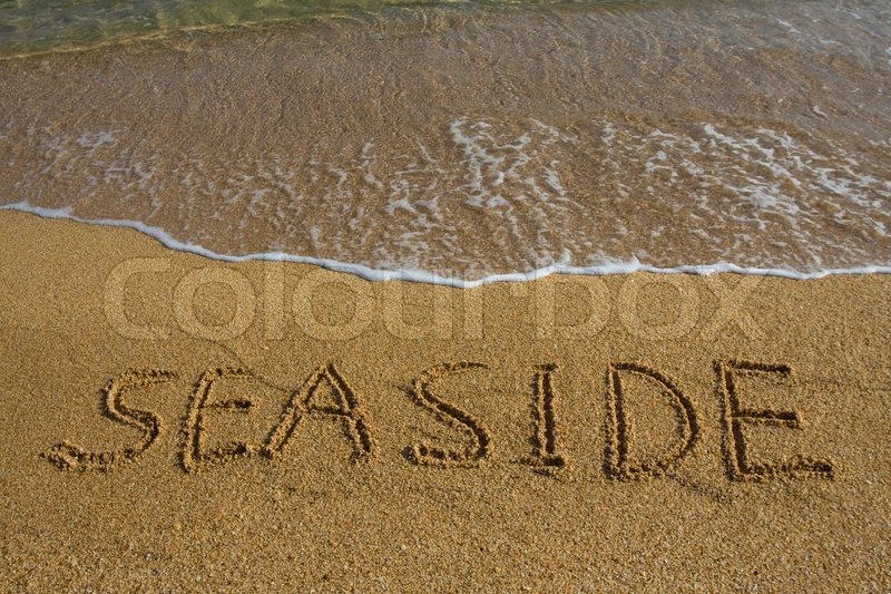 Simple word seaside in the sand on the ... | Stock image | Colourbox