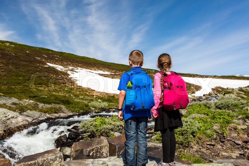Two young and active children trekking ... | Stock Photo | Colourbox