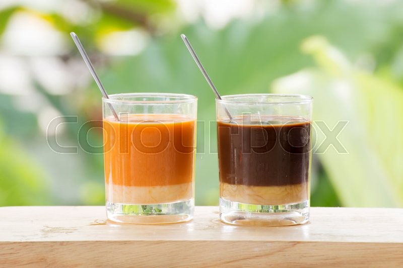 Glass of Thai Tea and Coffee on the ... | Stock image | Colourbox