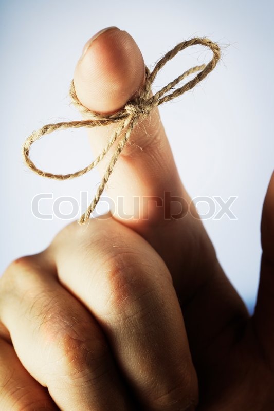 Ein Stück Schnur um Zeigefinger ... | Stock Bild | Colourbox