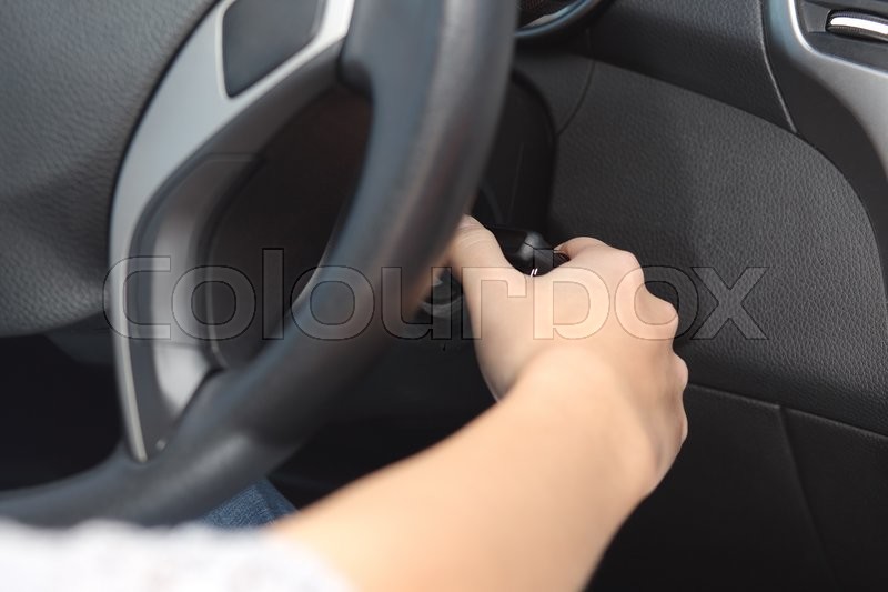 Closeup of a driver hand starting the ... | Stock image | Colourbox
