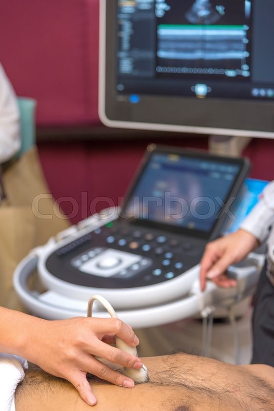 Closeup of man getting an ultrasound ... | Stock image | Colourbox