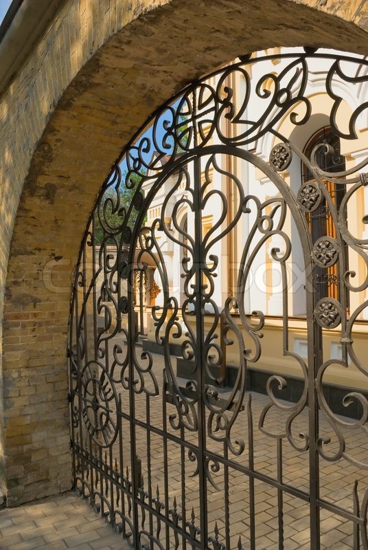 Stone wall and iron gate | Stock image | Colourbox