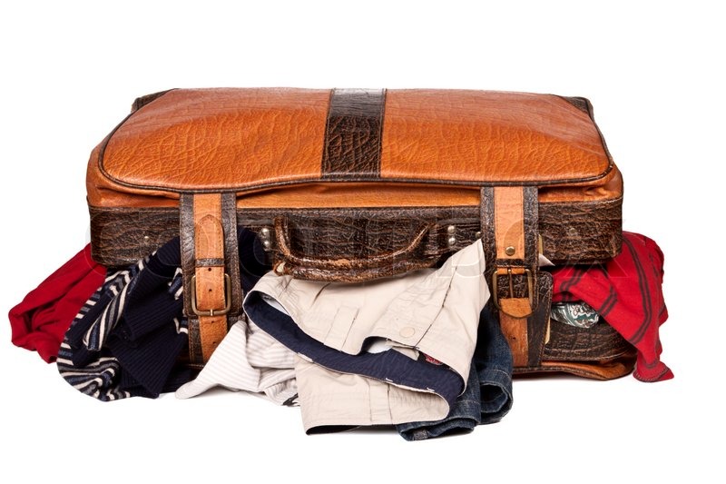 Overstuffed baggage in old suitcase ... | Stock image | Colourbox