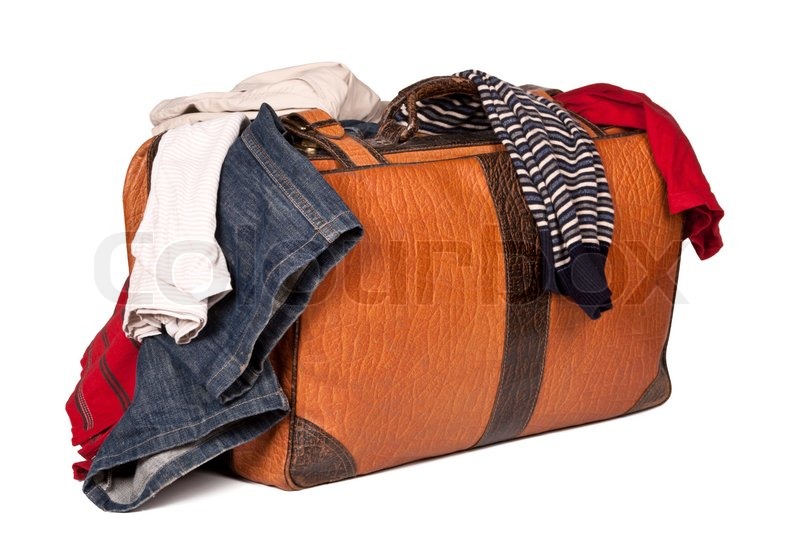 Overstuffed baggage in old suitcase ... | Stock image | Colourbox