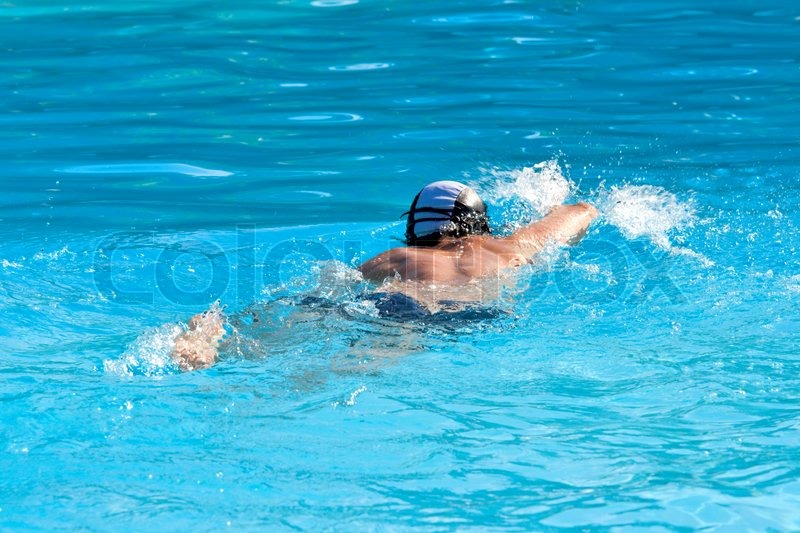 Athletic Man swimming in the pool | Stock image | Colourbox