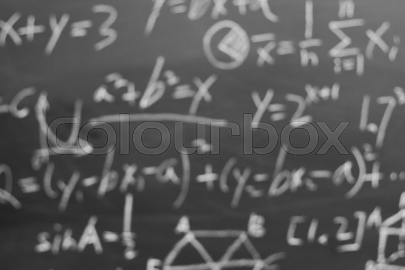 Blurred maths formulas written by white ... | Stock image | Colourbox