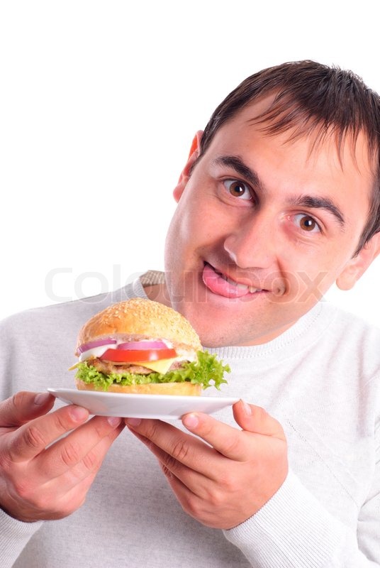 Hungry man very need a hamburger ... | Stock Photo | Colourbox