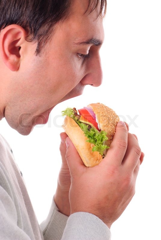 Hungry man very need a hamburger ... | Stock image | Colourbox