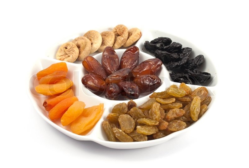 Different kinds of dried fruits on ... | Stock image | Colourbox