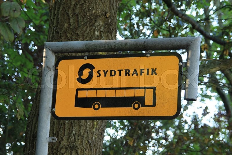 Bus station with a yellow bus sign in ... | Stock image | Colourbox