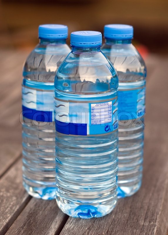 Wasser in drei Wasserflaschen in Farbe ... | Stock Bild | Colourbox