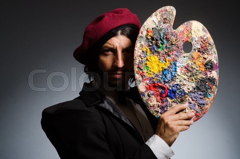 Funny artist working in the studio | Stock image | Colourbox